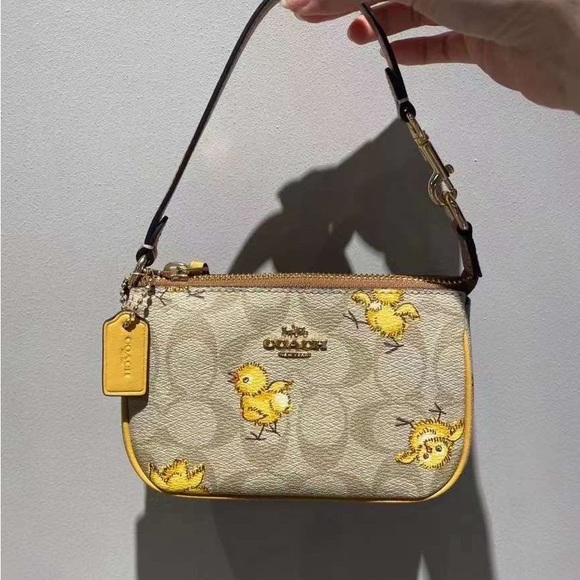 Coach | Bags | Coach Nolita 5 In Signature Canvas With Tossed Chick ...